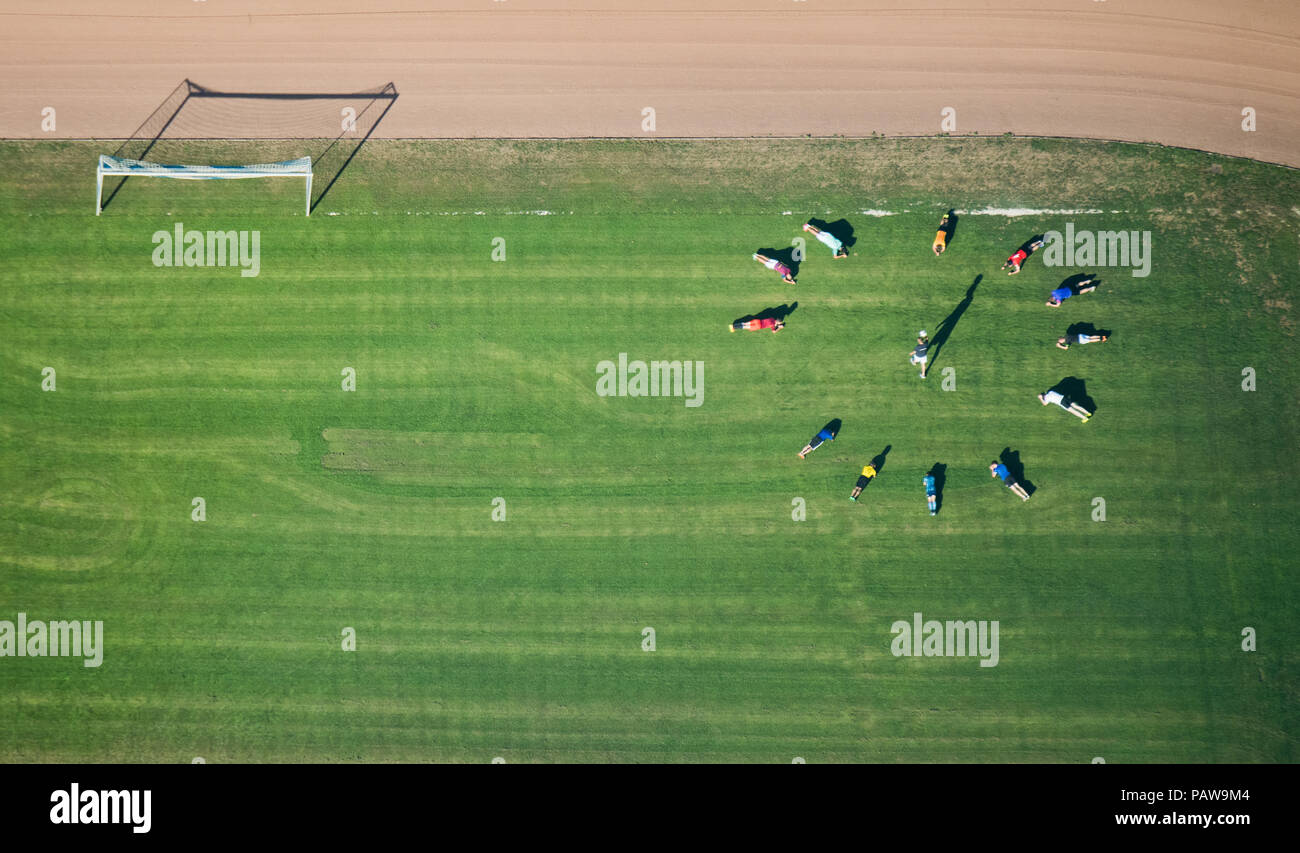 Germany, Laatzen. 24th July, 2017. Twelve footballers and their trainer ...