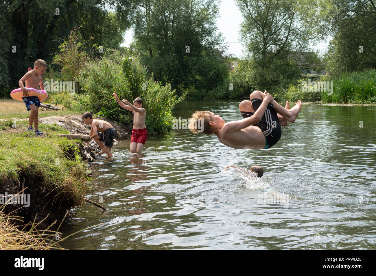 Kids jumping in a river hi-res stock photography and images - Alamy