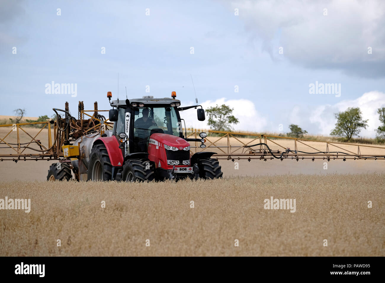 Harvesting tractor farm land scotland hi-res stock photography and ...