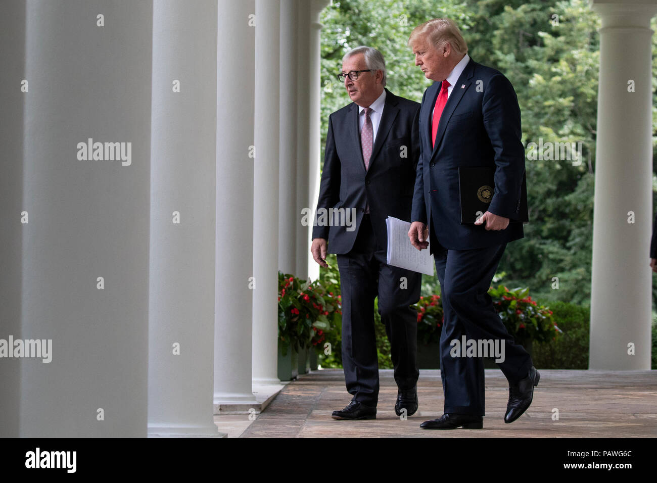 United States President Donald Trump walks on the West Wing Colonnade ...