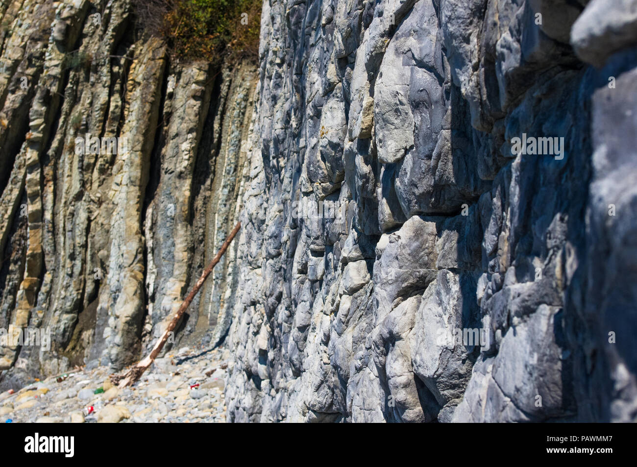 rock formations and stones of the sea coast, weathered and smoothed by ...