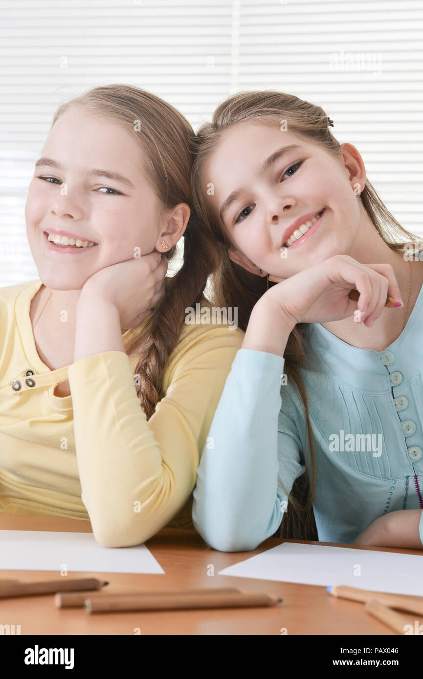 Little girls doing their homework hi-res stock photography and images ...