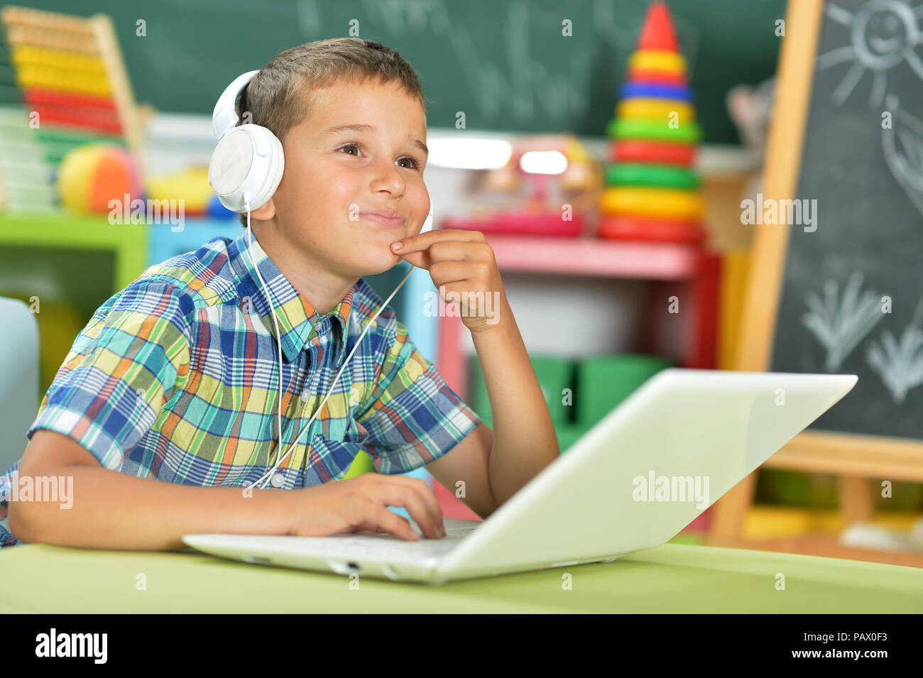 little boy using laptop Stock Photo - Alamy