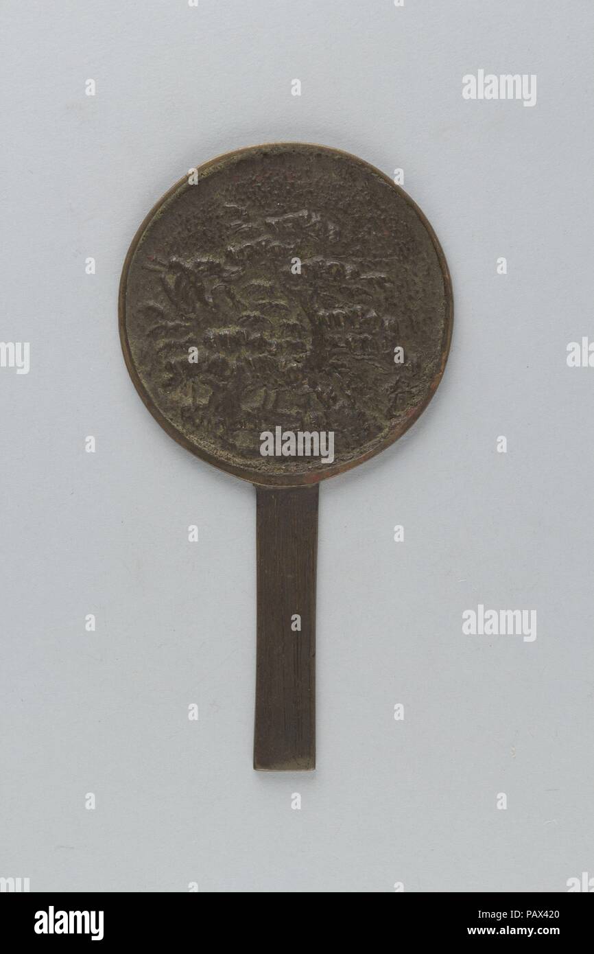 Mirror. Culture: Japan. Dimensions: L. 6 1/4 in. (15.9 cm); Diam. 3 1/8 ...