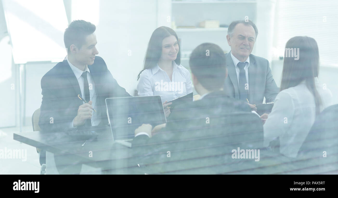 From behind glass colleagues hi-res stock photography and images - Alamy