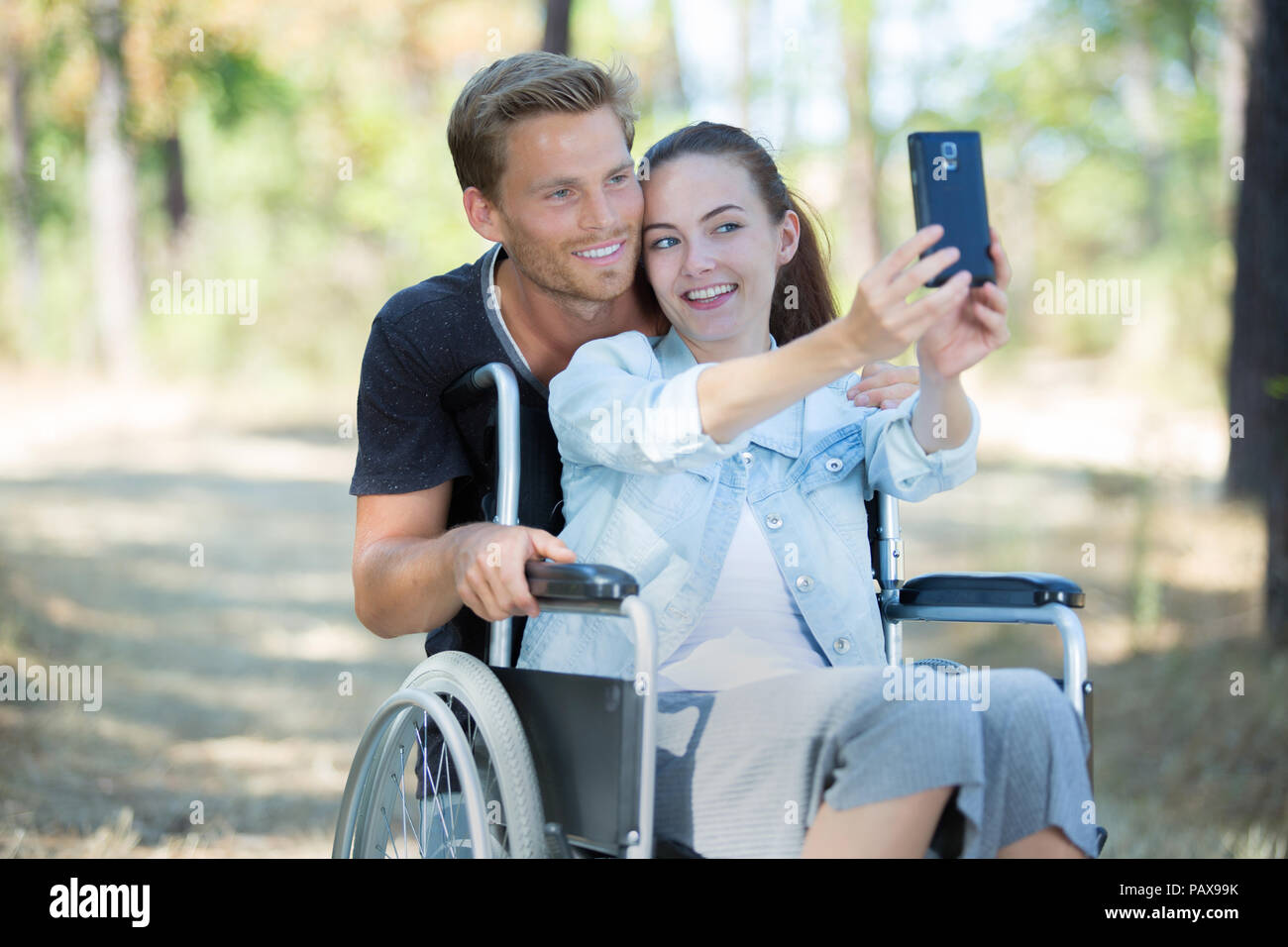 disability positive concept with woman on wheelchair Stock Photo - Alamy