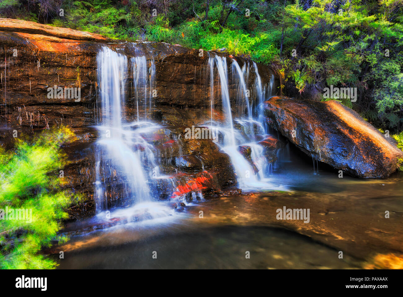 Flowing blurred waterfalls hi-res stock photography and images - Alamy