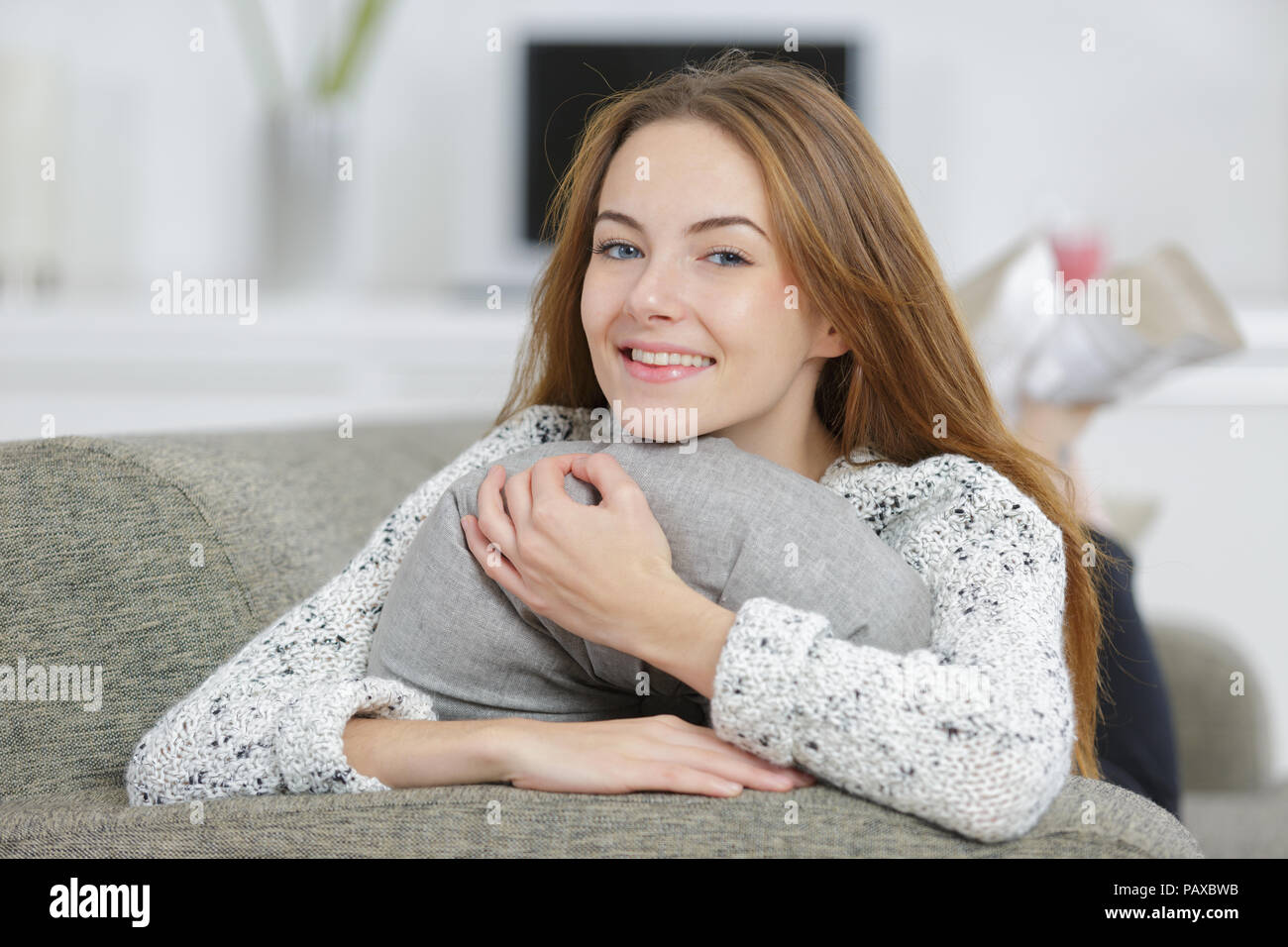 Woman hugging computer screen hi-res stock photography and images - Alamy