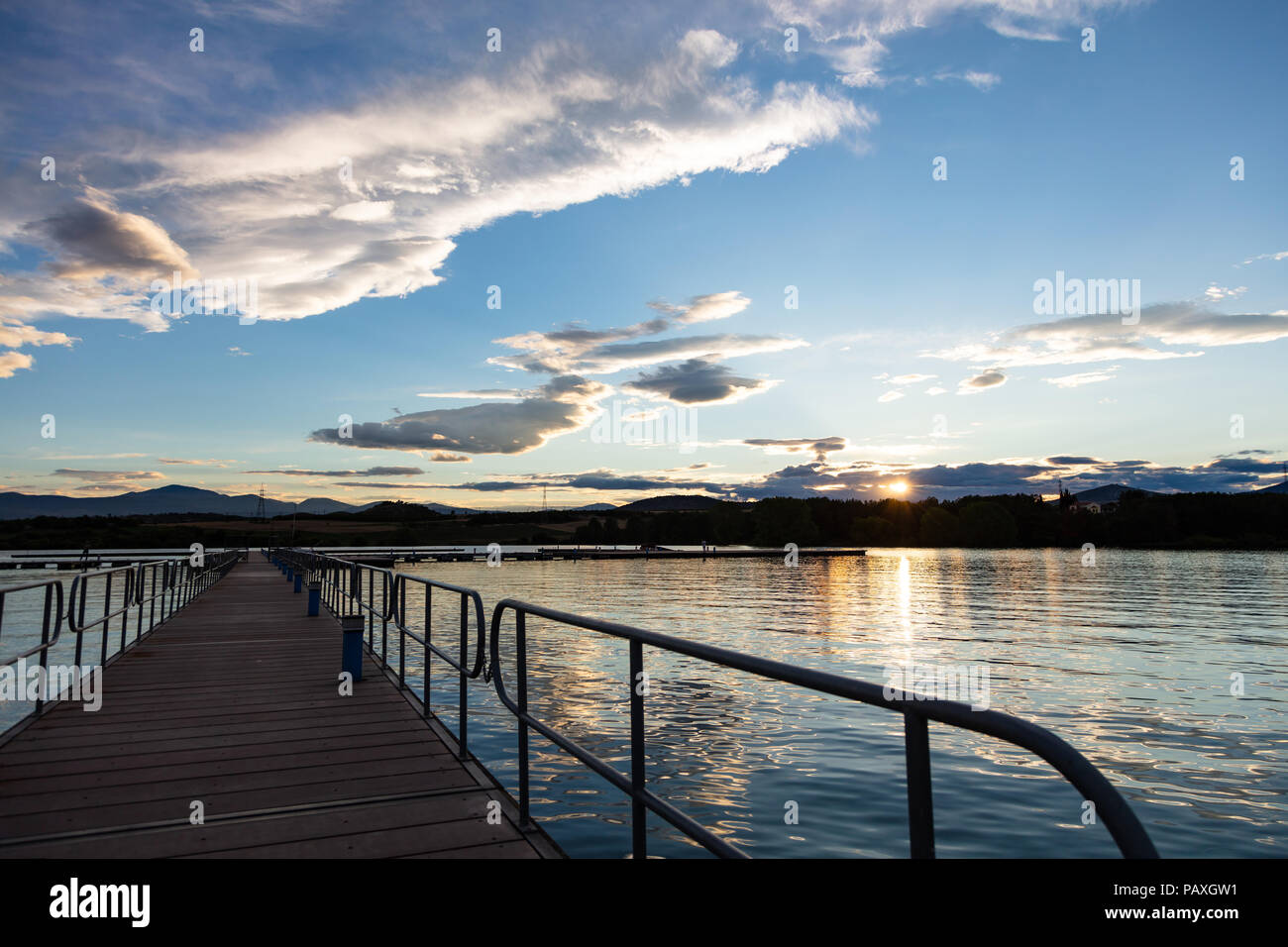 Breathtaking view. Sunrise sunset gazing from wooden pier over sea ...