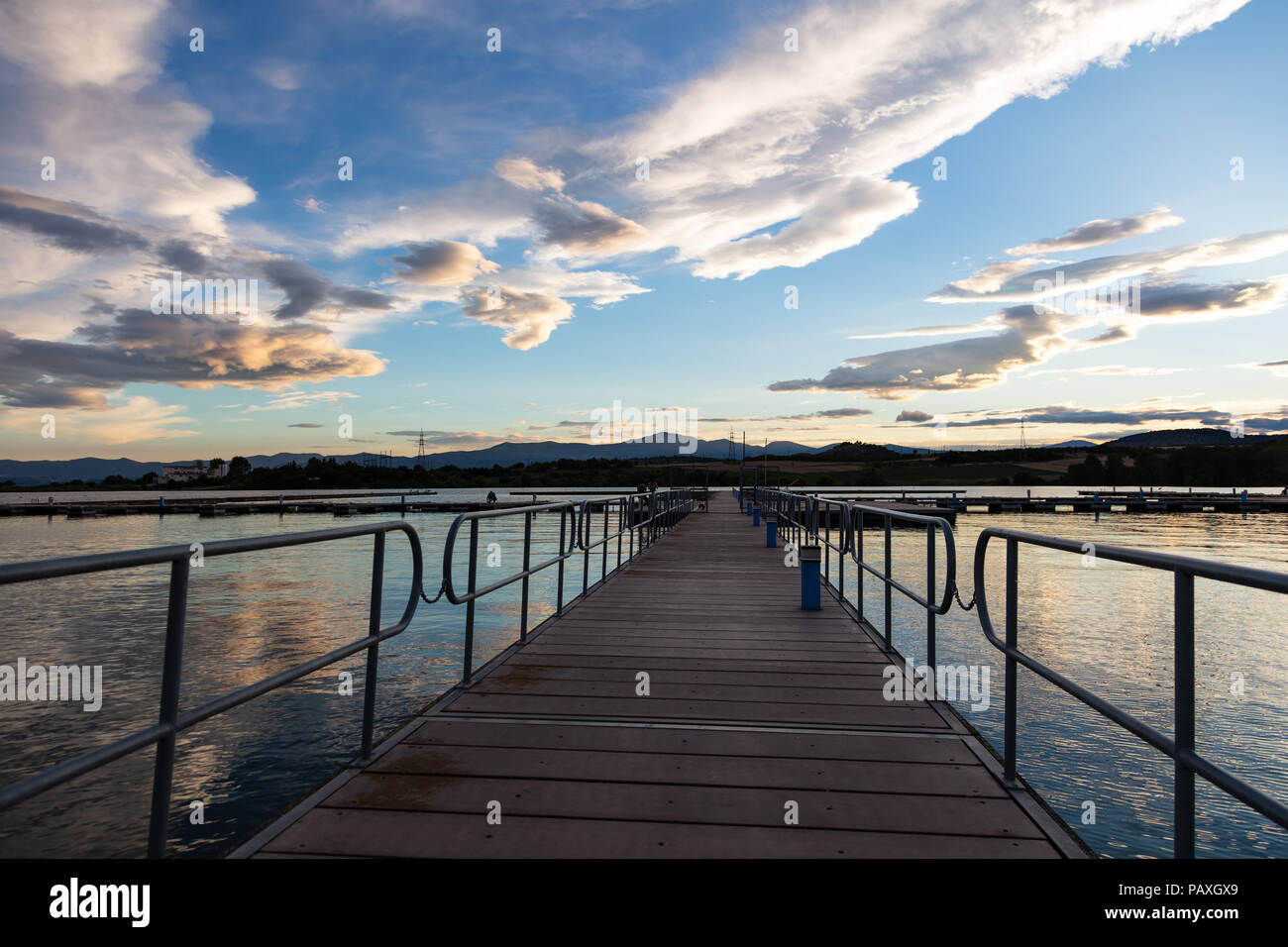 Breathtaking view. Sunrise sunset gazing from wooden pier over sea ...