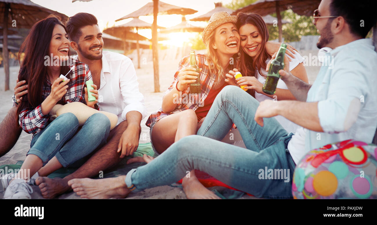 Happy friends laughing and smiling outdoors Stock Photo - Alamy