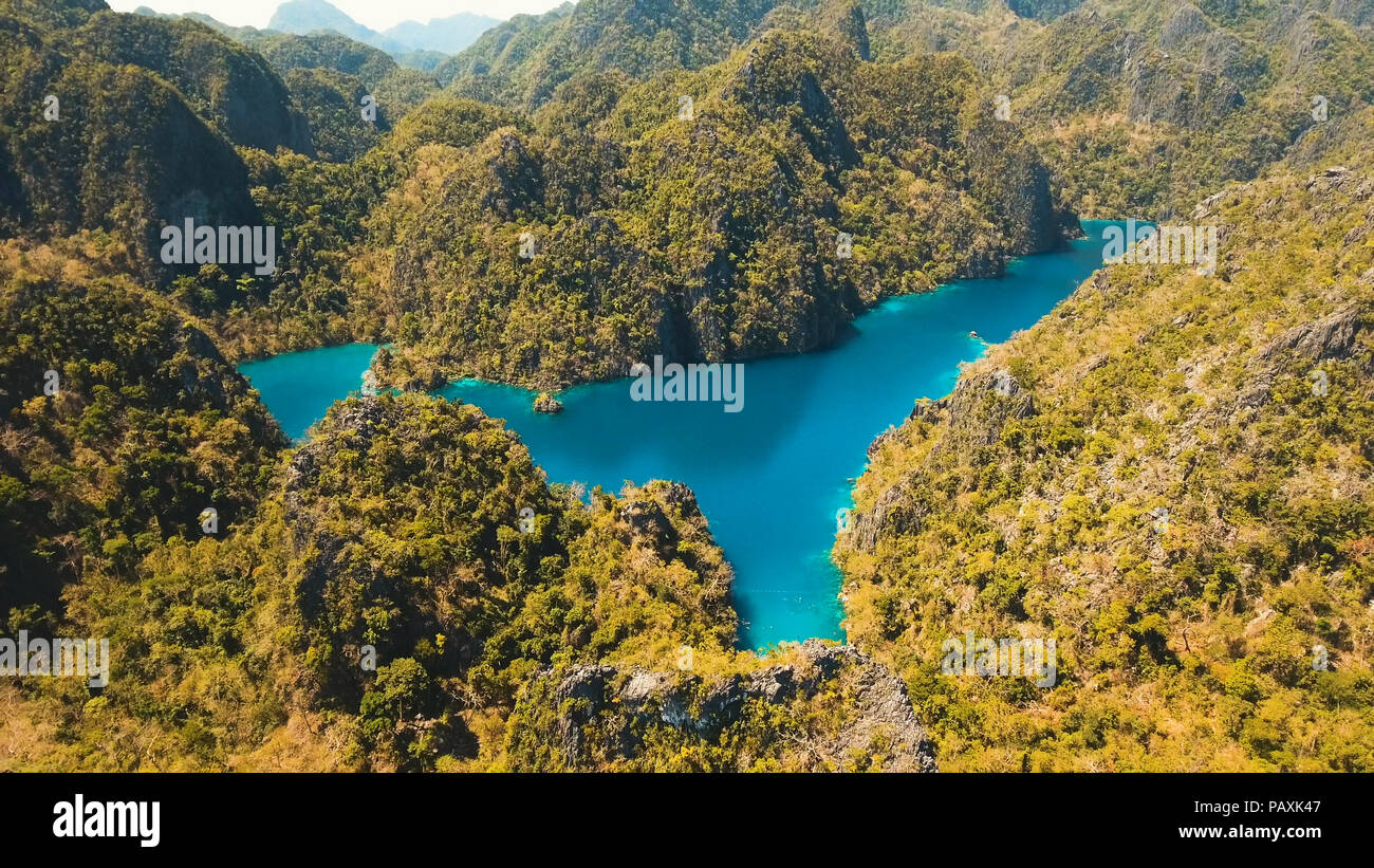 Aerial view:Mountain Kayangan lake,on a tropical island with blue water ...