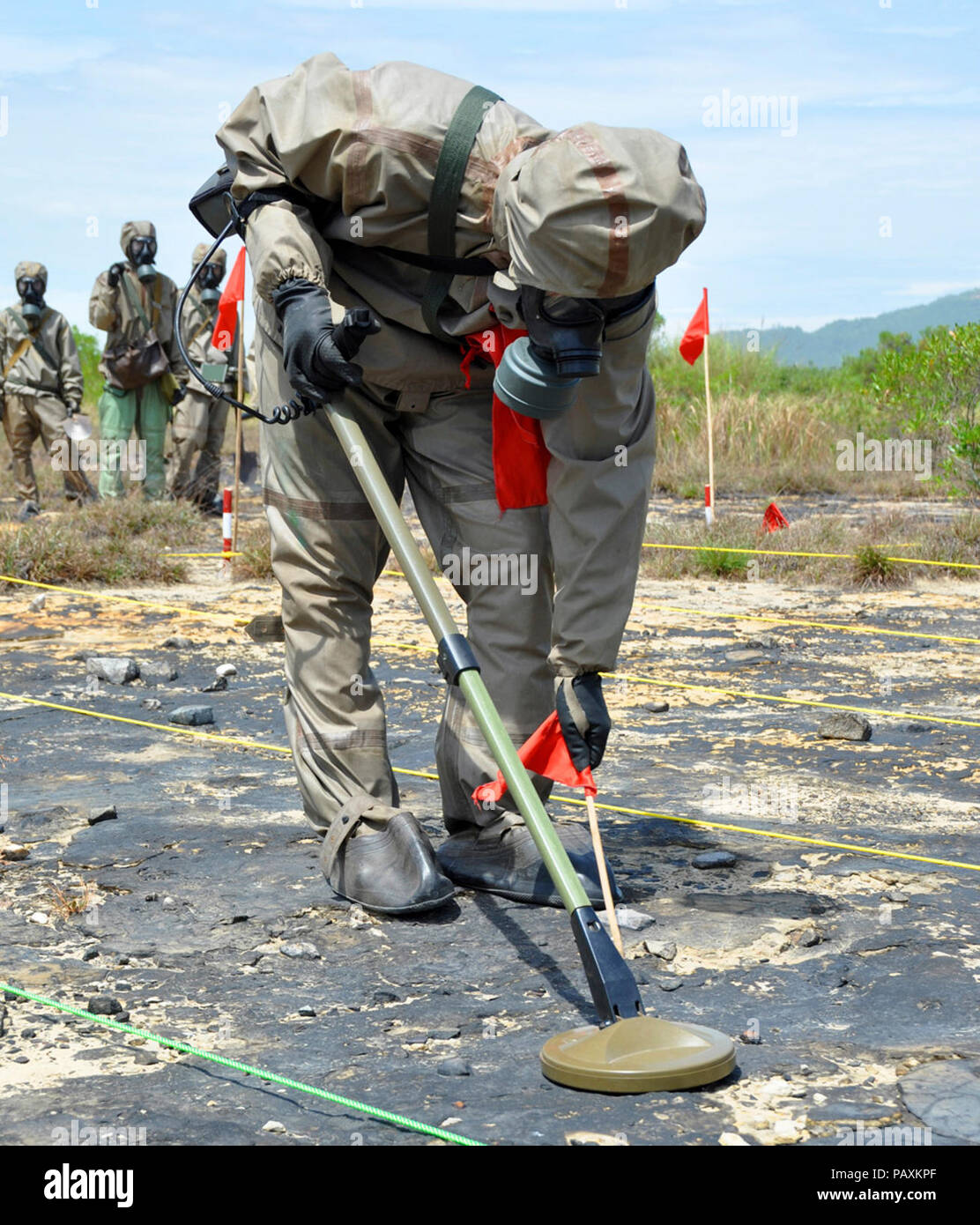 A Vietnamese soldier demonstrates UXO detection and clearance in Danang ...
