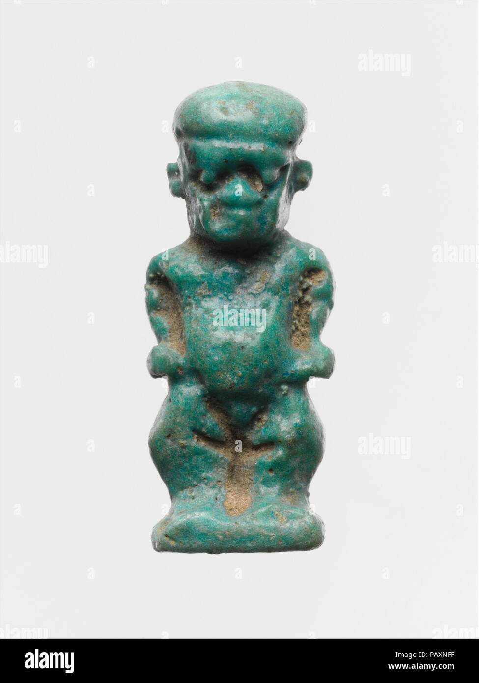 Faience amulet in the form of the dwarf god Pataikos. Culture: Egyptian ...
