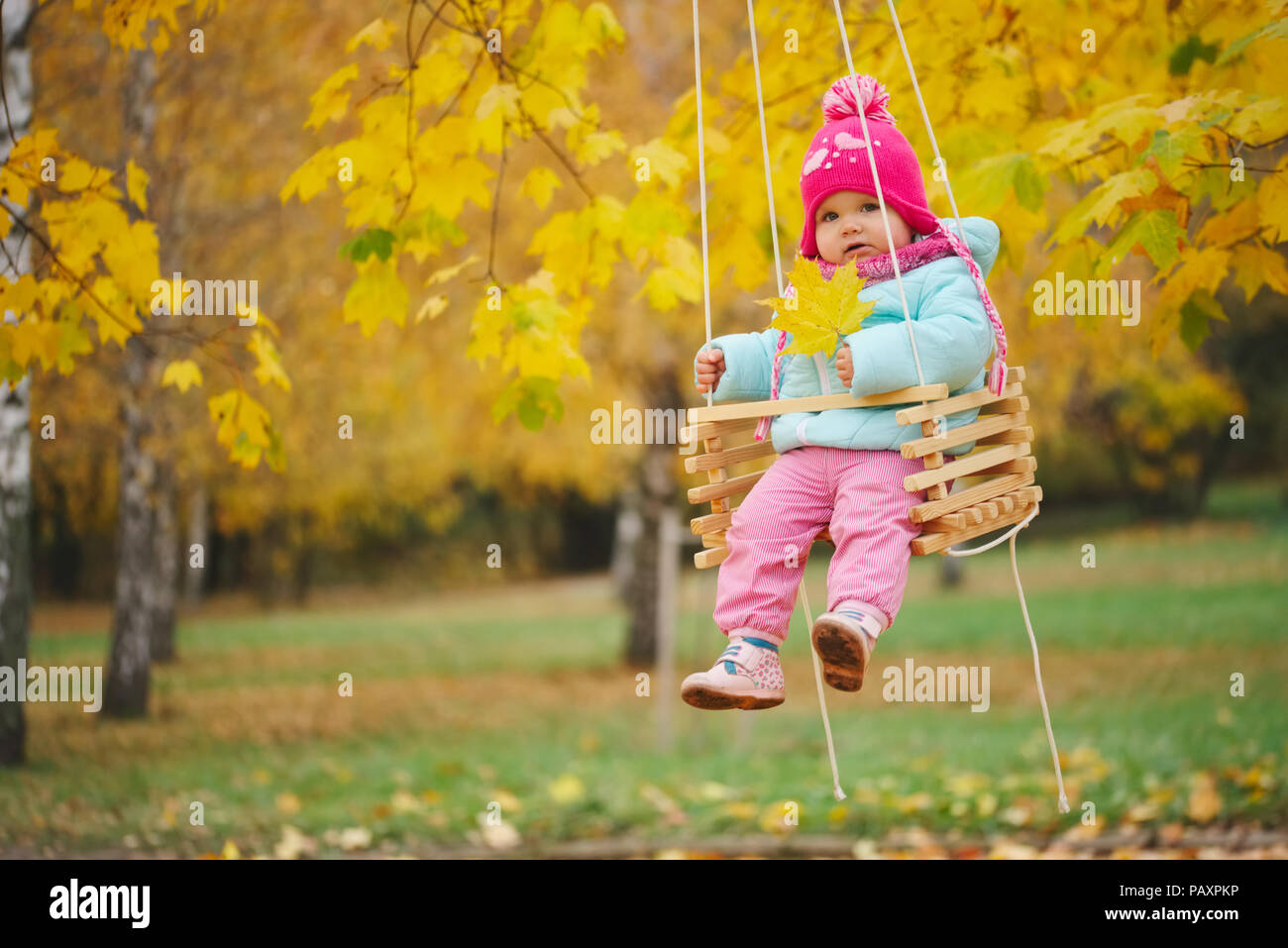 Swings in autumn hi-res stock photography and images - Alamy