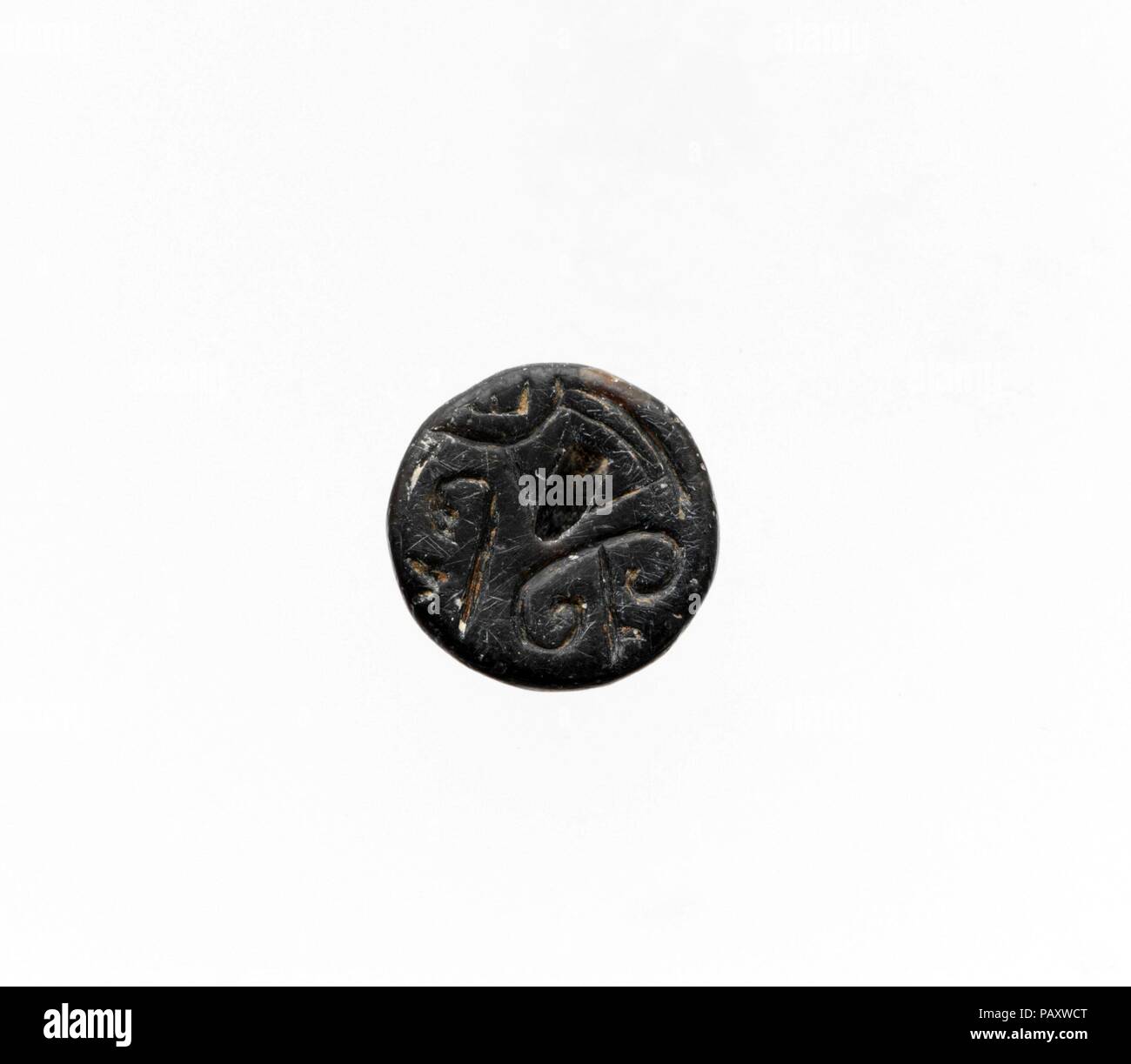 Serpentine hemispheroid seal. Culture: Minoan. Dimensions: Diameter 1. ...