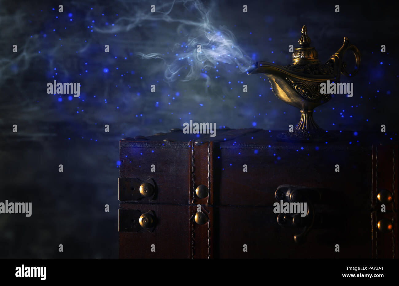 Image of magical mysterious aladdin lamp with glitter sparkle smoke ...