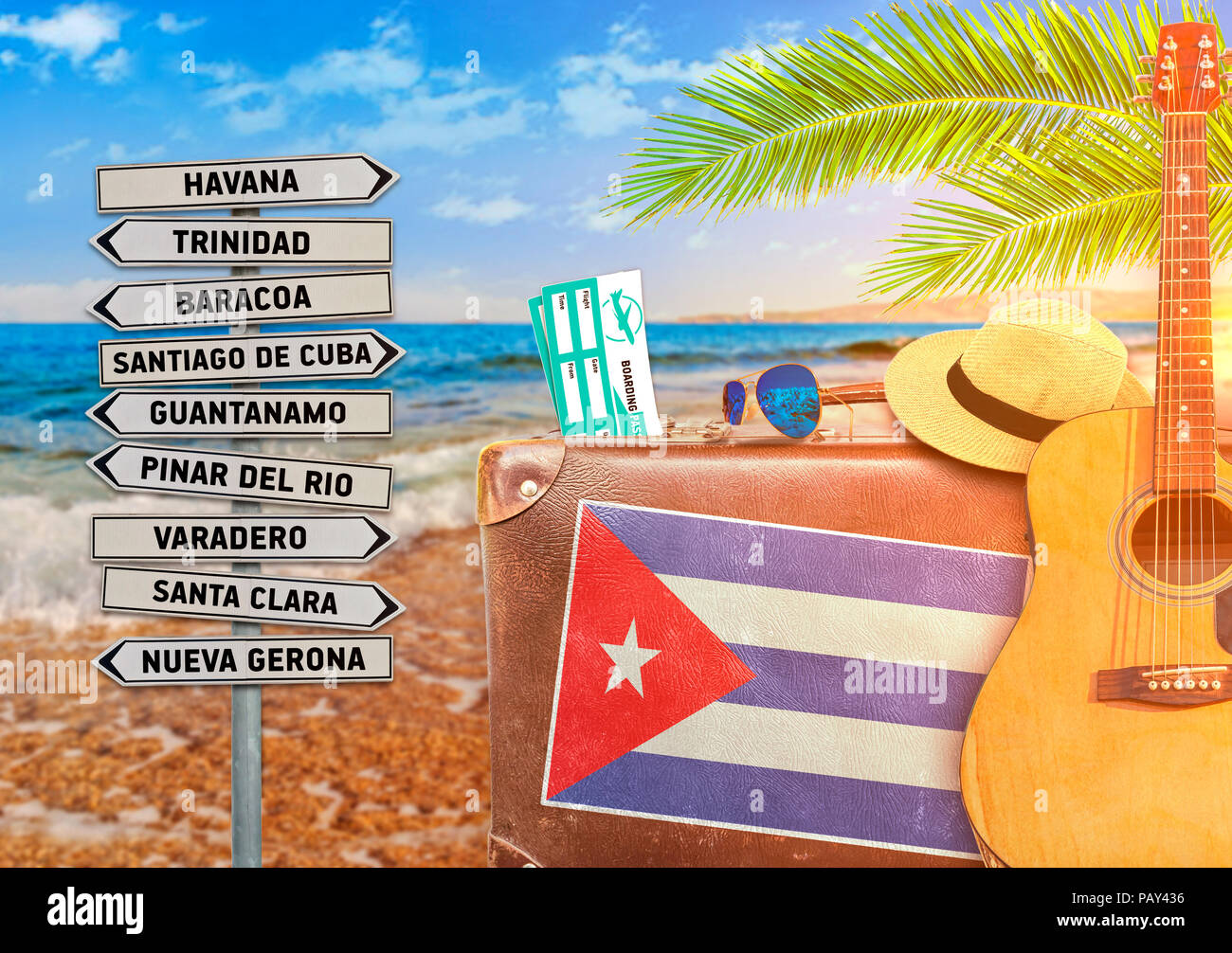 Concept of summer traveling with old suitcase and Cuba town sign Stock ...