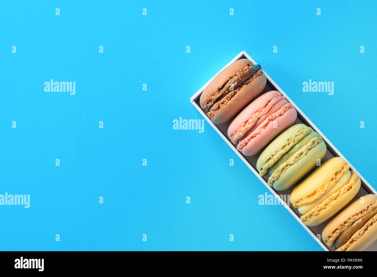 Variety of Multicolored Pink Green Yellow Brown Mocha Coffee Macaroons ...