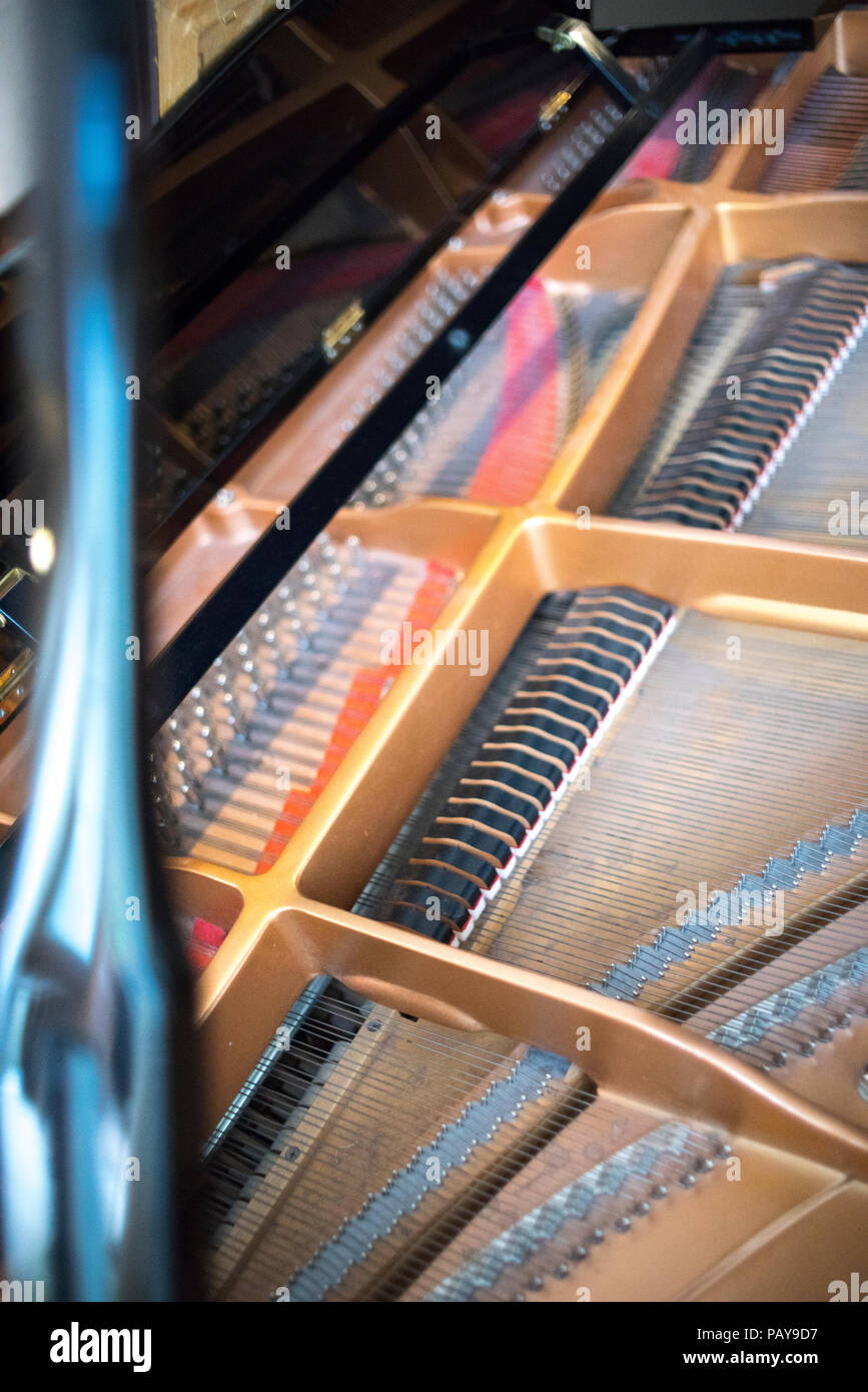 Concert hall grand piano strings ready for classical music performance ...