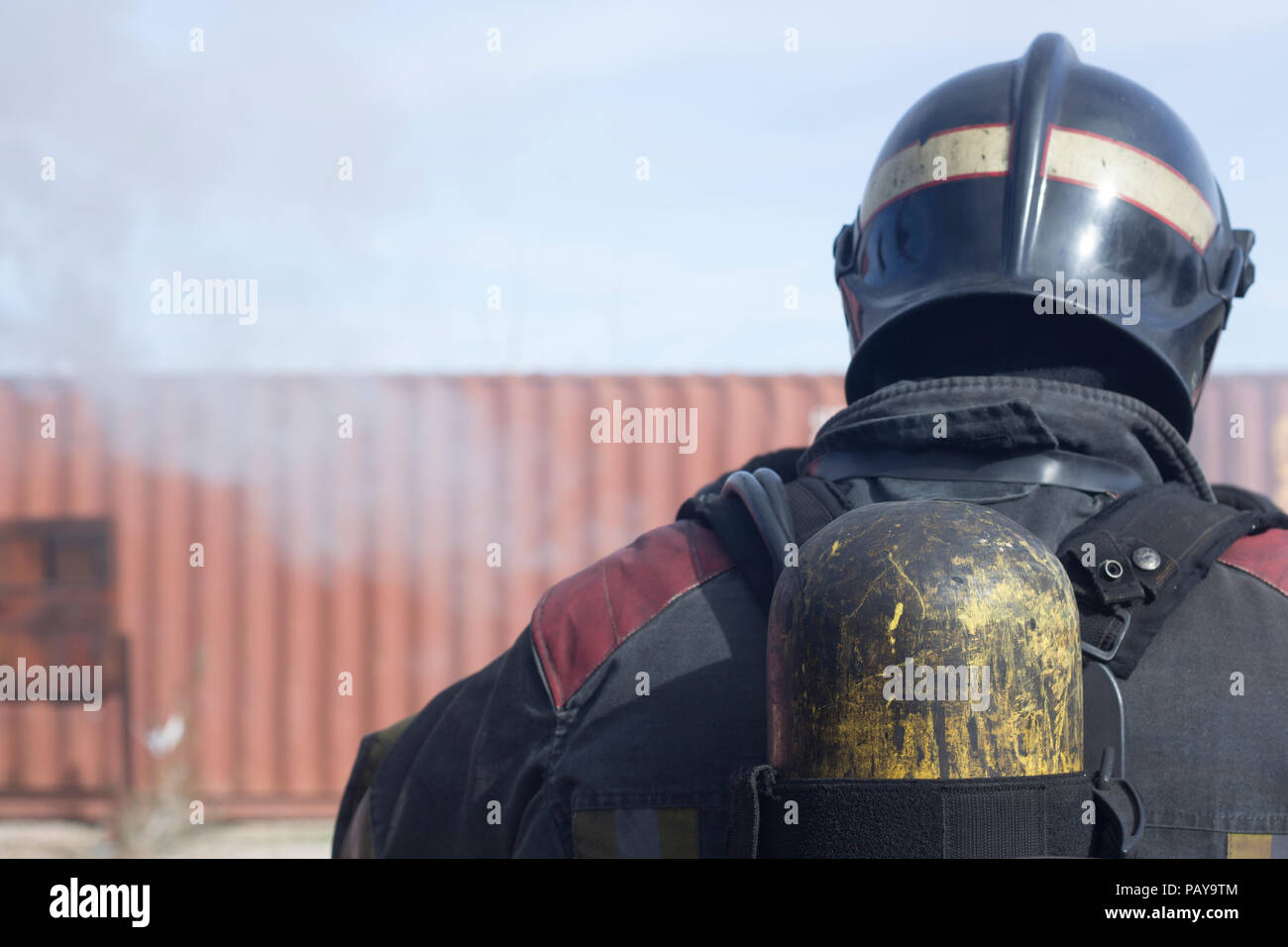 Firefighter putting out fire training station extinguisher backdraft ...