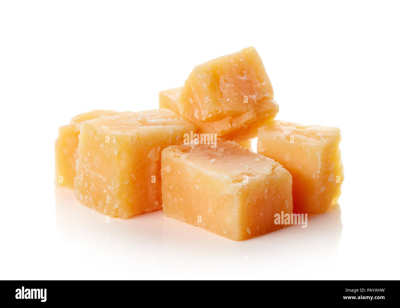Heap of parmesan cheese cubes isolated on white background Stock Photo ...