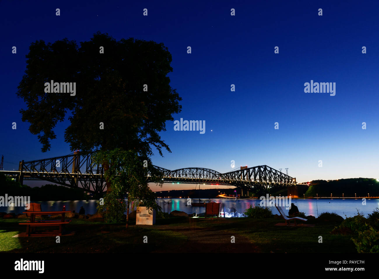 The Pont du Quebec and the St Lawrence River at dusk as seen from Parc ...