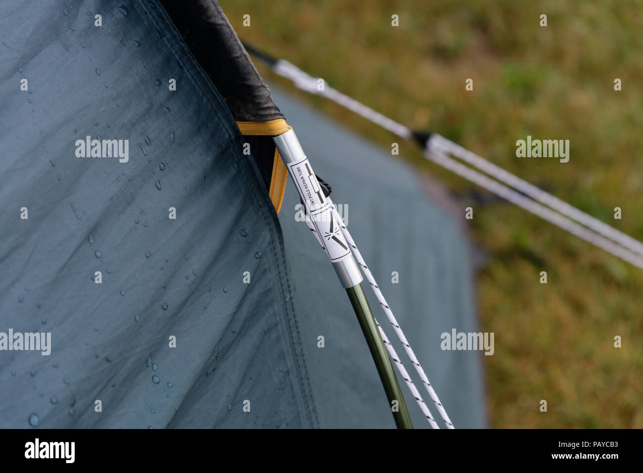 A broken tent pole repaired using an aluminium repair sleeve Stock ...