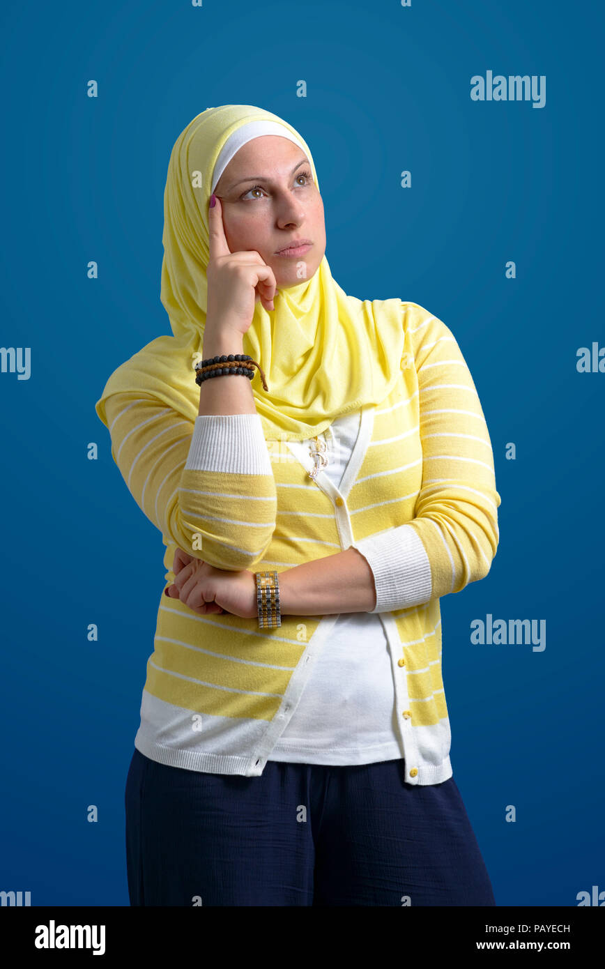 Hijab girl thinking hi-res stock photography and images - Alamy