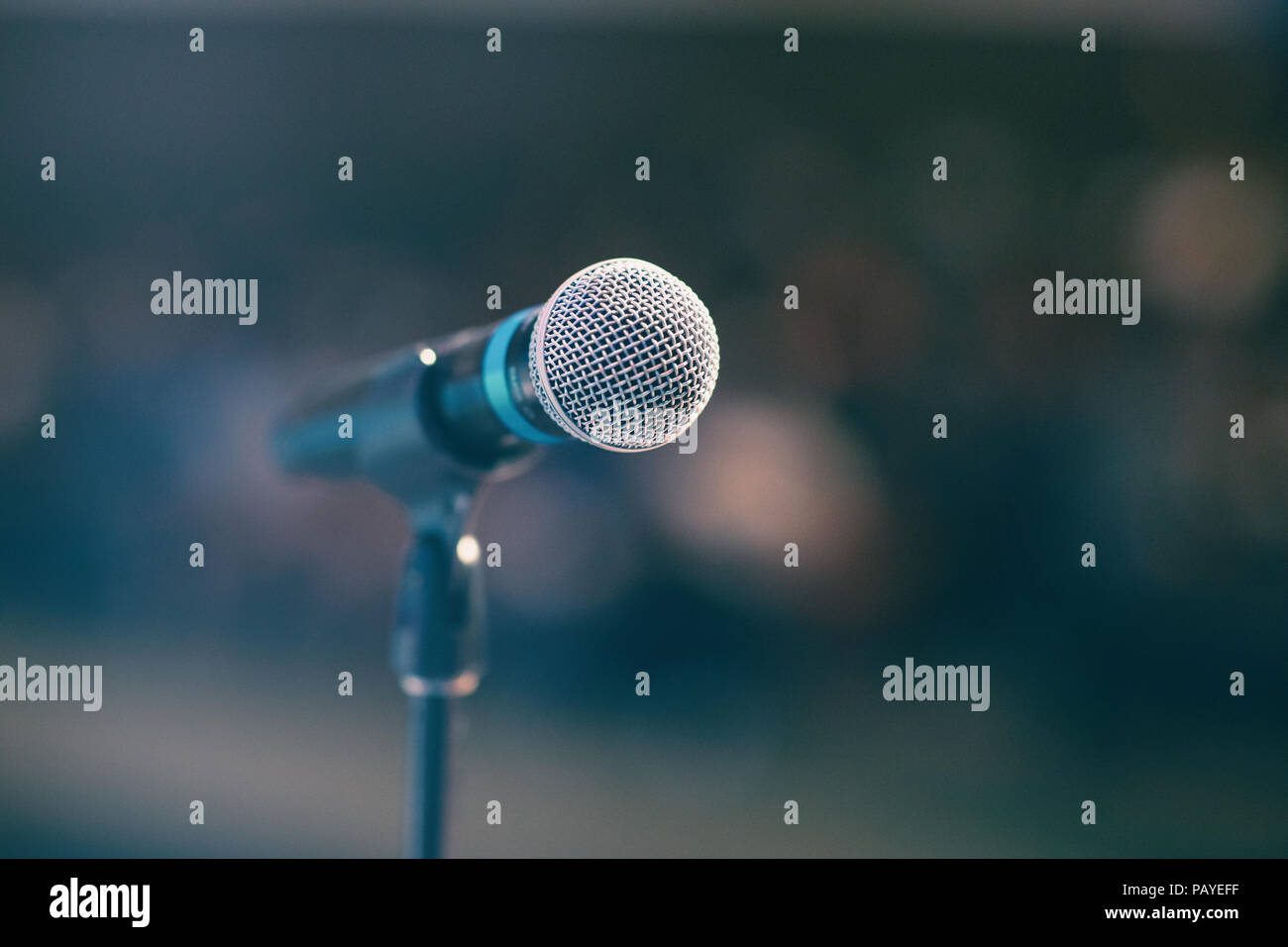 Classic microphone, vintage edition, blurred auditorium Stock Photo - Alamy