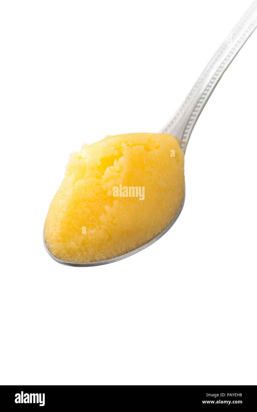 Spoon Full of Ghee Isolated on White Background Stock Photo - Alamy