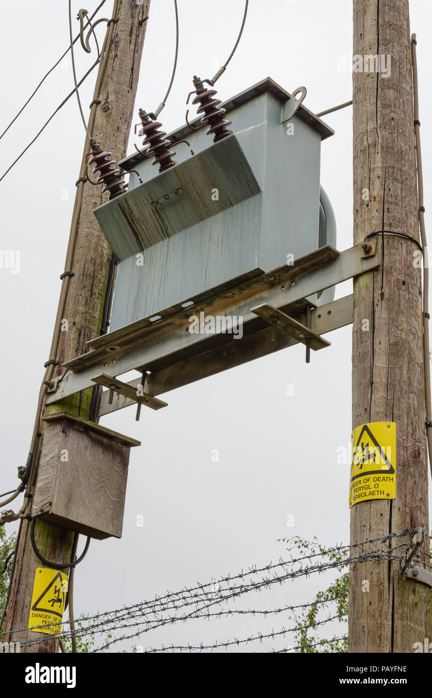 Electricity transformer outdoor mounted on wooden supporting frame ...