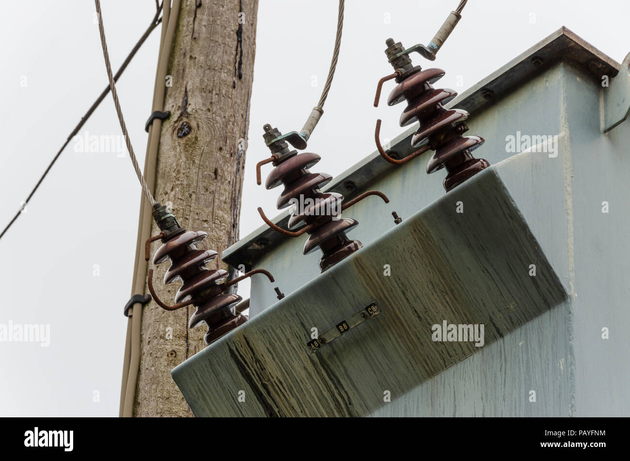 Electricity transformer outdoor mounted on wooden supporting frame ...