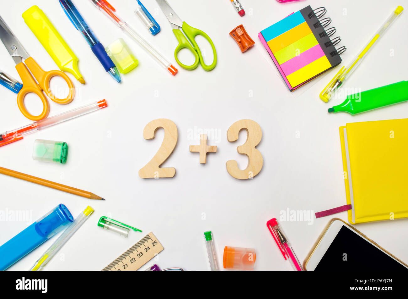 mathematics. numbers 2 plus 3 on the school desk. concept of education ...