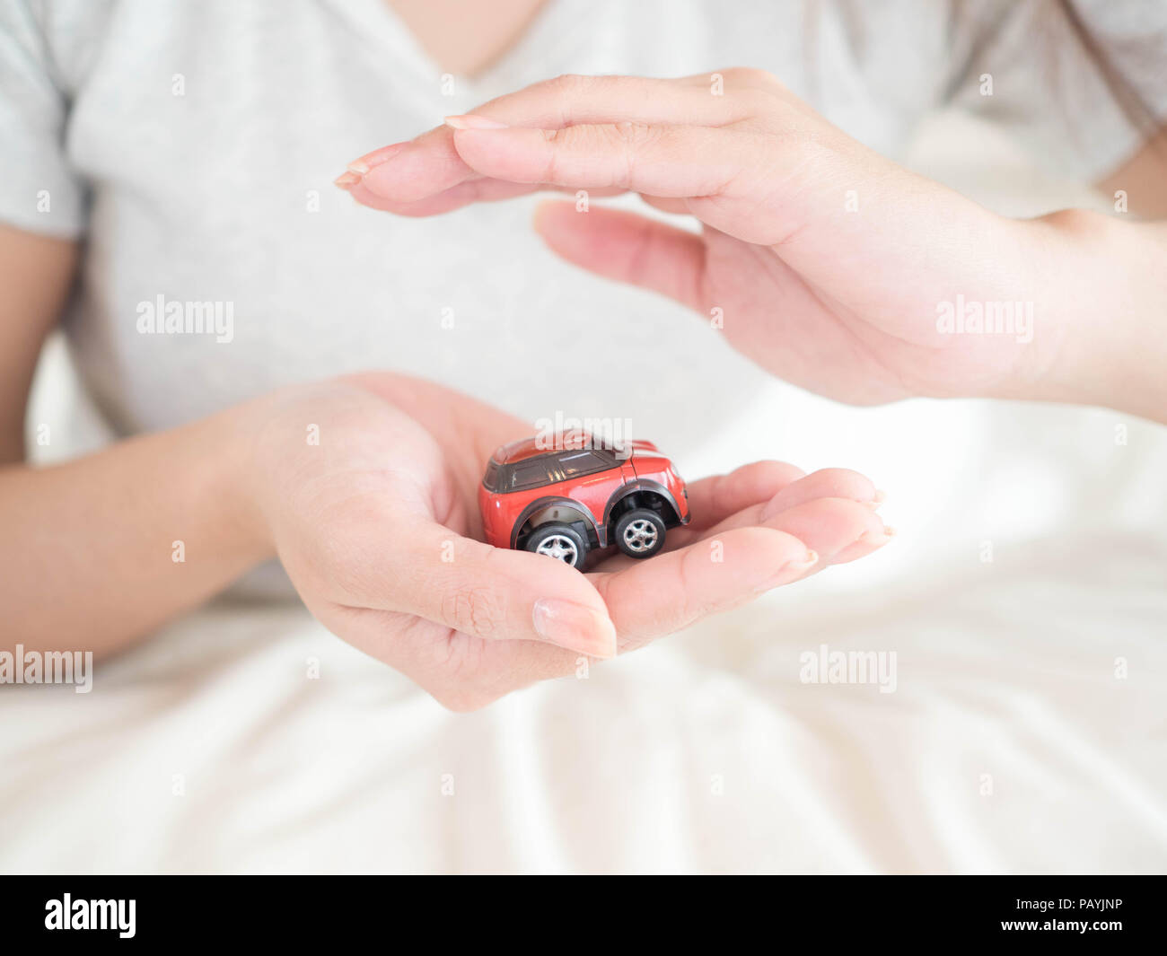 car in female hand Stock Photo - Alamy