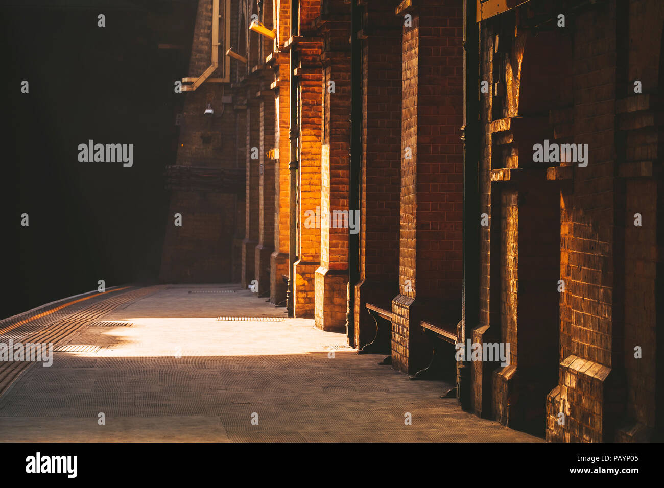 Dramatic light in empty underground London station. Mysterious ...