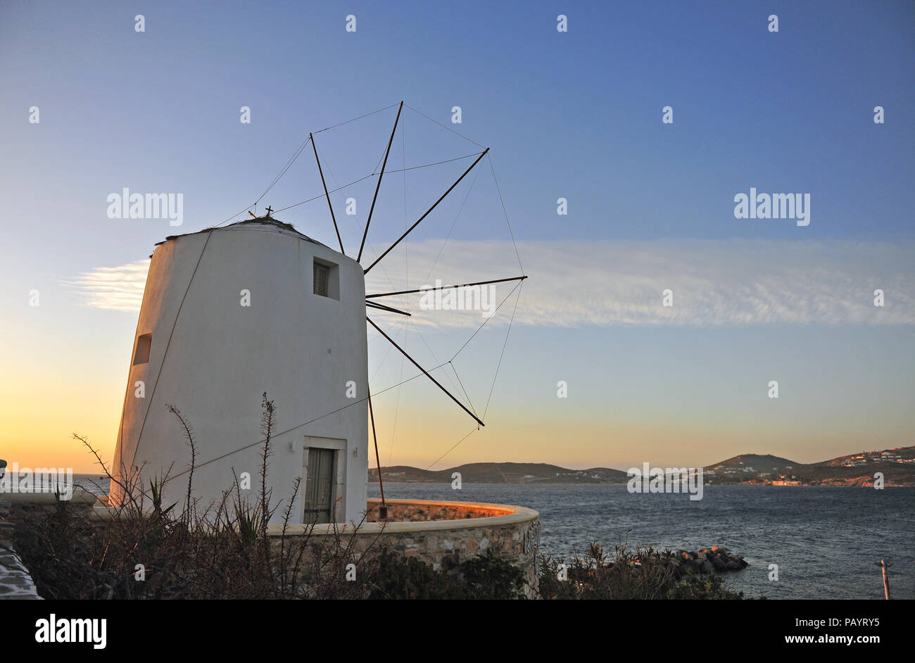 Traditional mediterranean greek windmill on sunset, Paros island ...