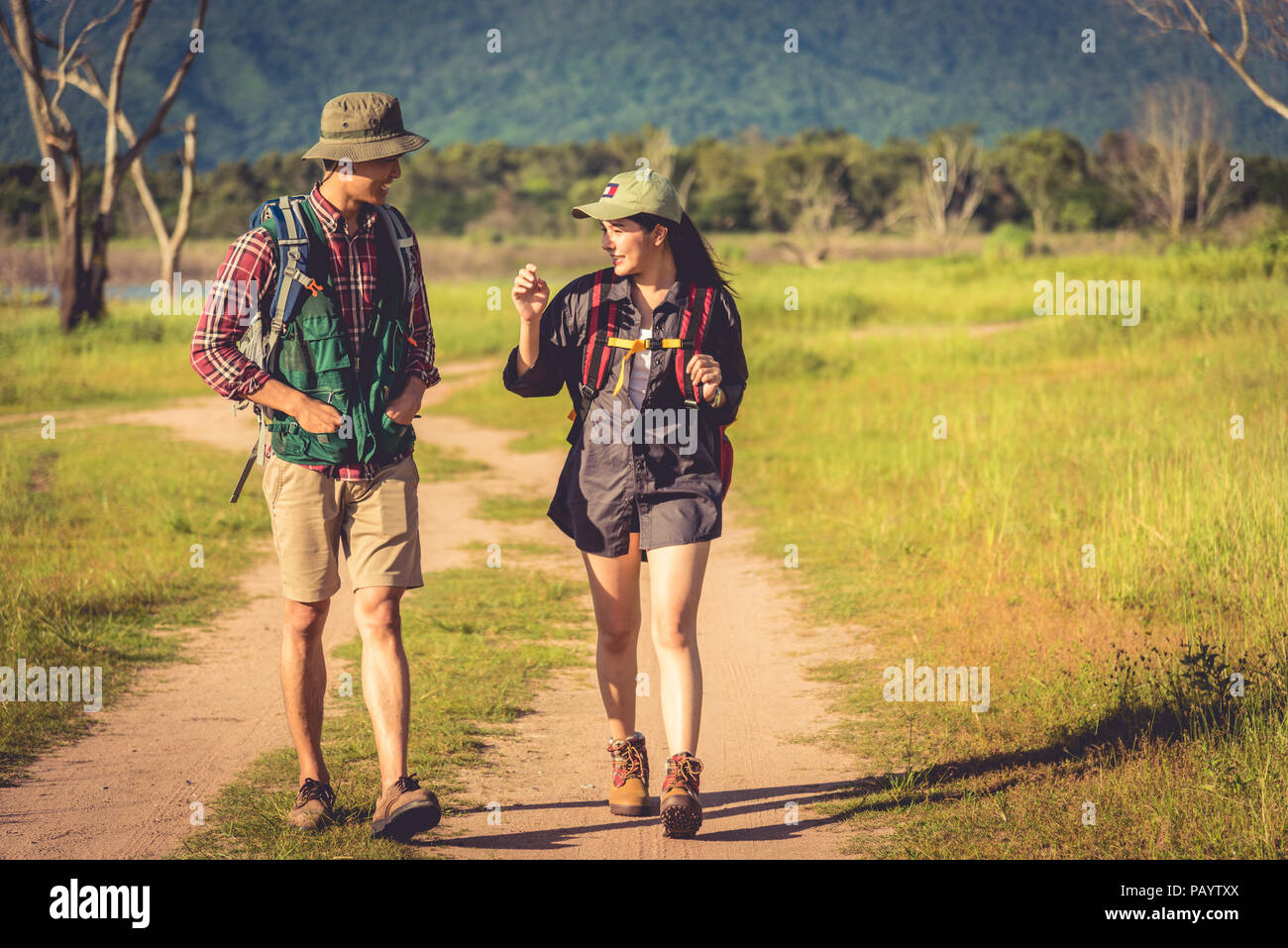 Two people walking hi-res stock photography and images - Alamy