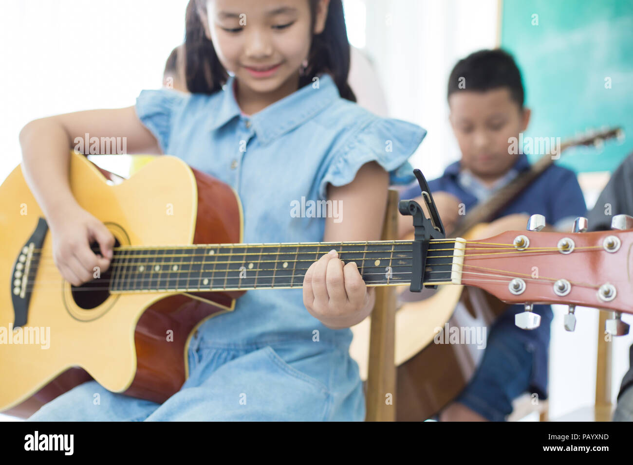 African children playing instrument hi-res stock photography and images ...