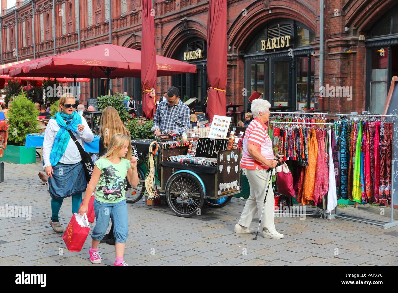 BERLIN, GERMANY - AUGUST 27, 2014: People visit Hackescher Markt square ...