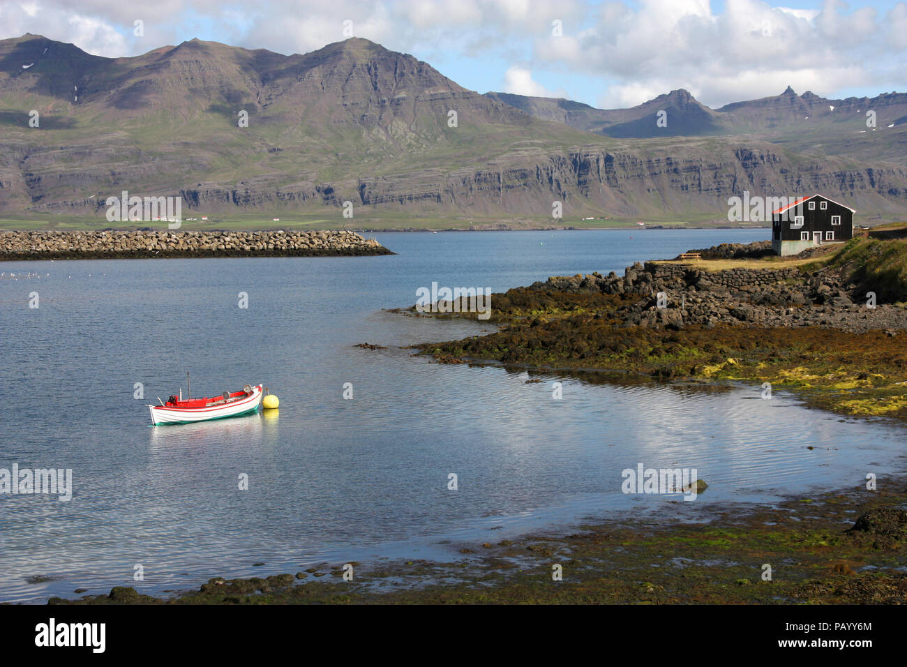 Iceland - Djupivogur, small fishing town. Mountains and fiord Stock ...