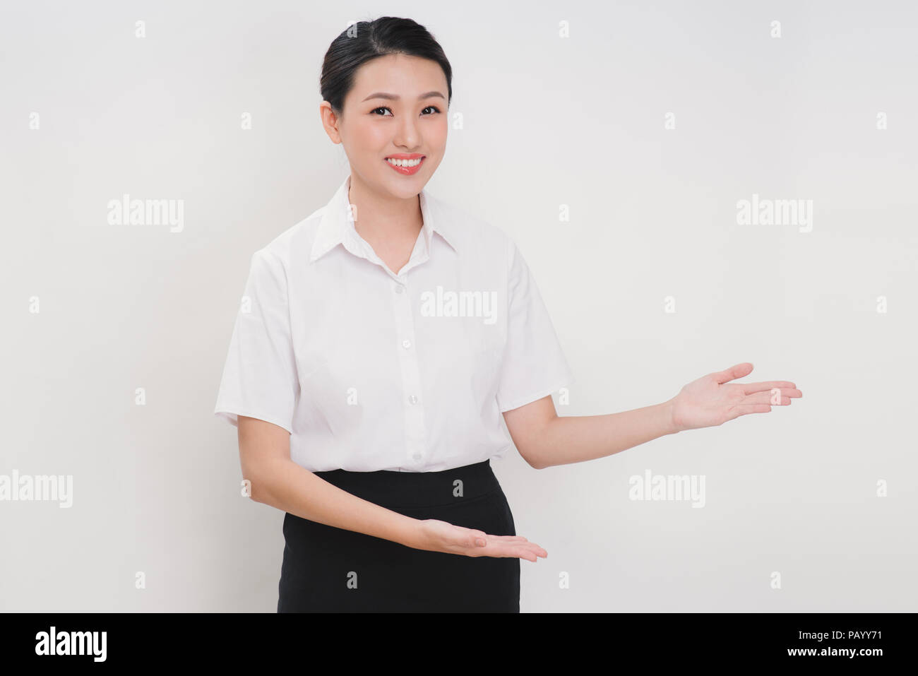 woman showing and presenting copy space isolated on white background ...
