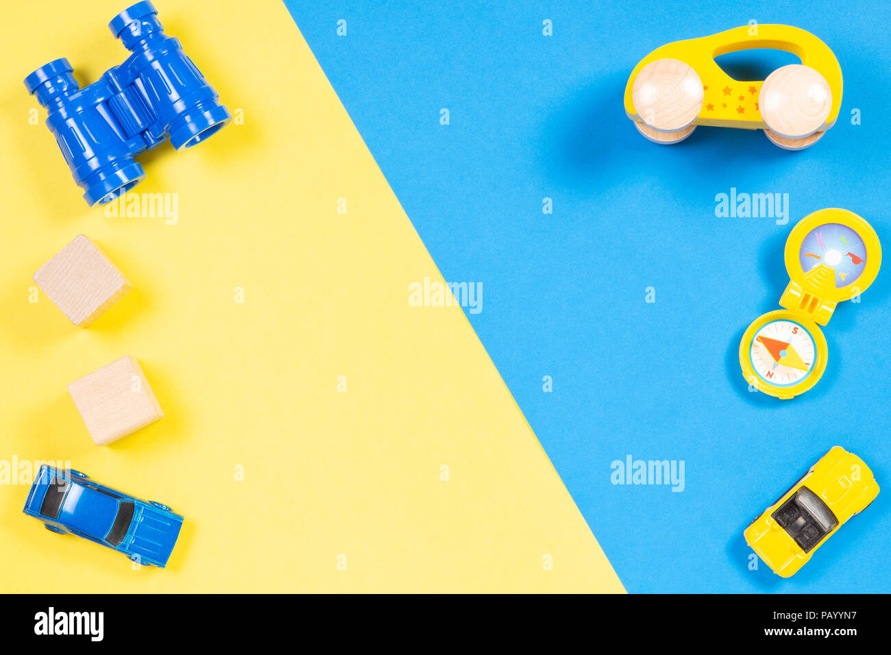 Colorful toy on blue and yellow background Stock Photo - Alamy
