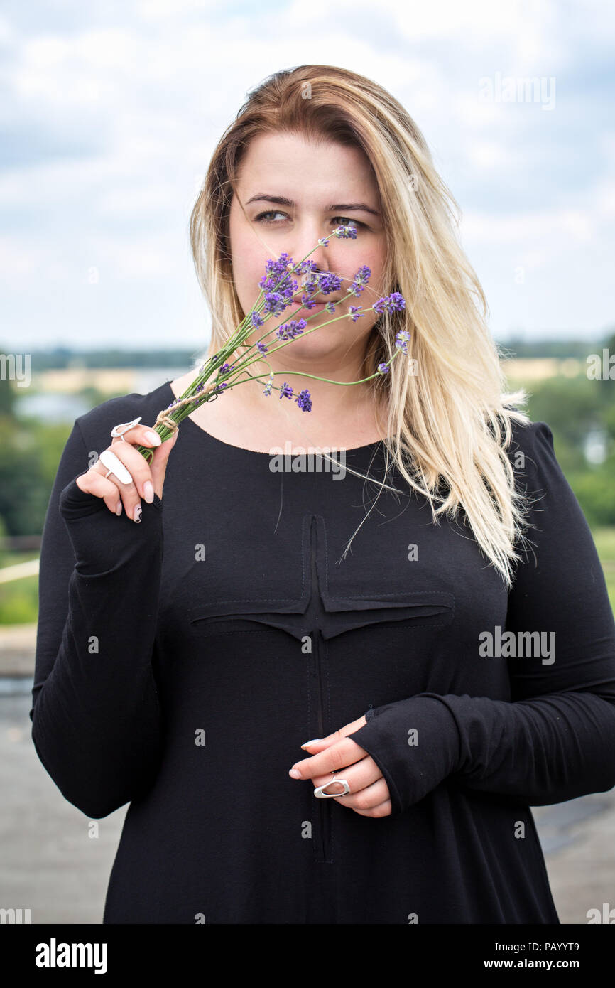 woman sniffing lavender Stock Photo - Alamy
