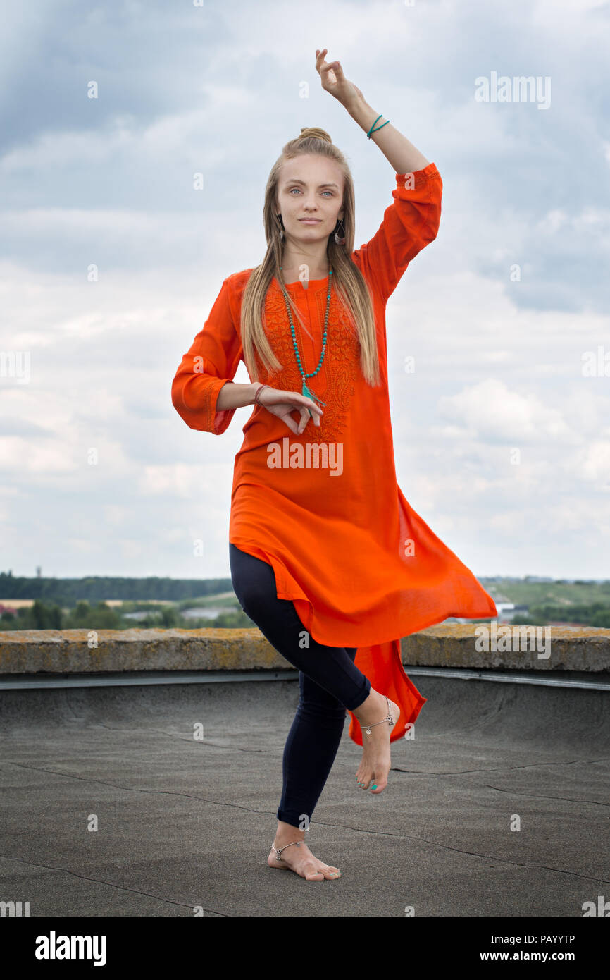 woman in asana Shiva dance Stock Photo - Alamy