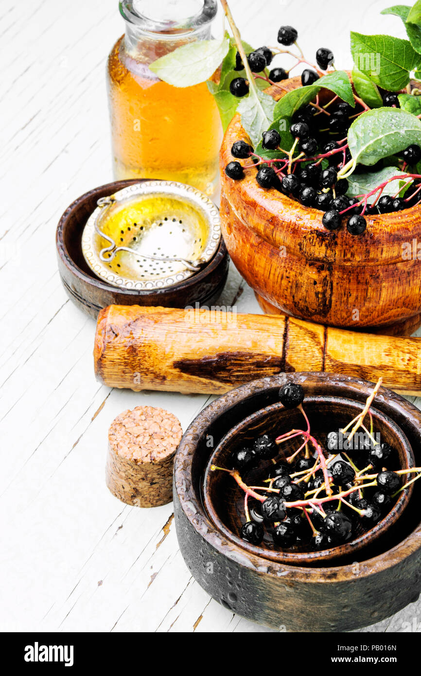 Bird-cherry with leaves and medicinal mixture.Herbal medicine Stock ...