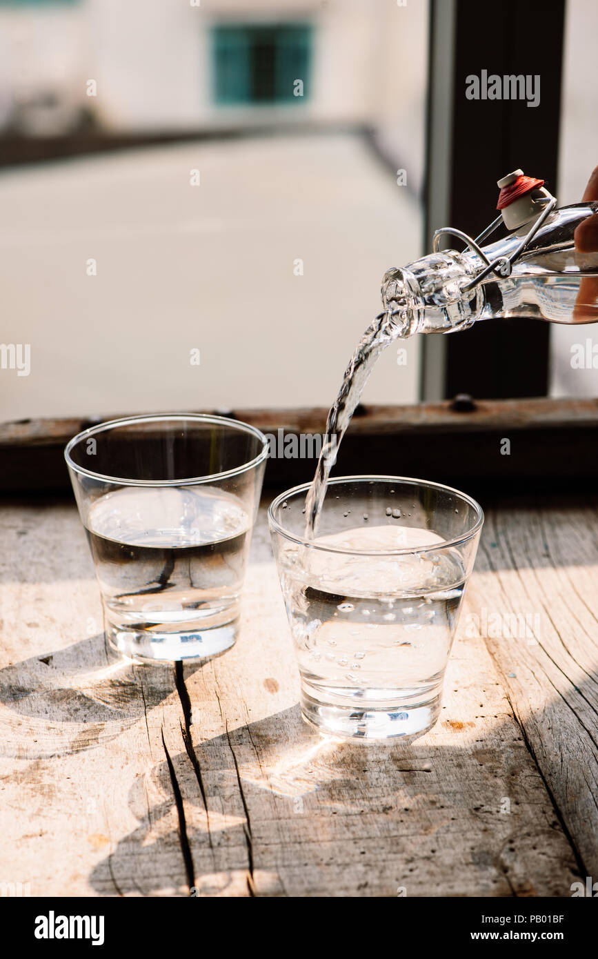 Pouring water into a glass hi-res stock photography and images - Alamy