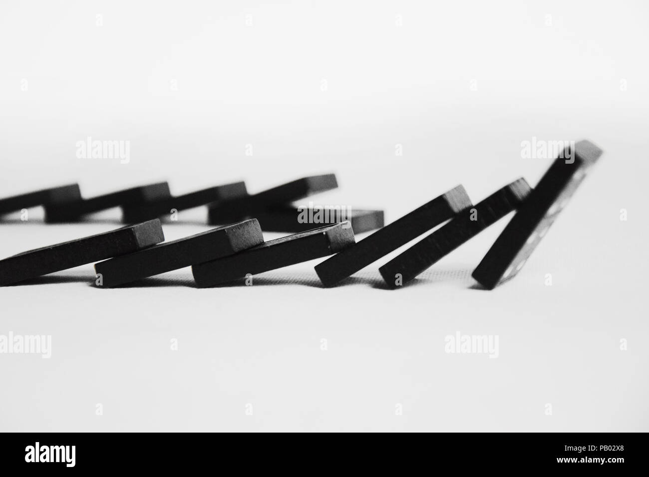 Falling Domino Pieces Stock Photo - Alamy
