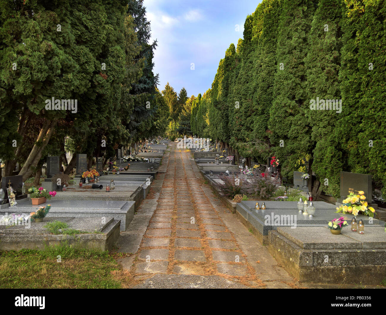 Christian cemetery with graves and spaces for cremation Stock Photo - Alamy