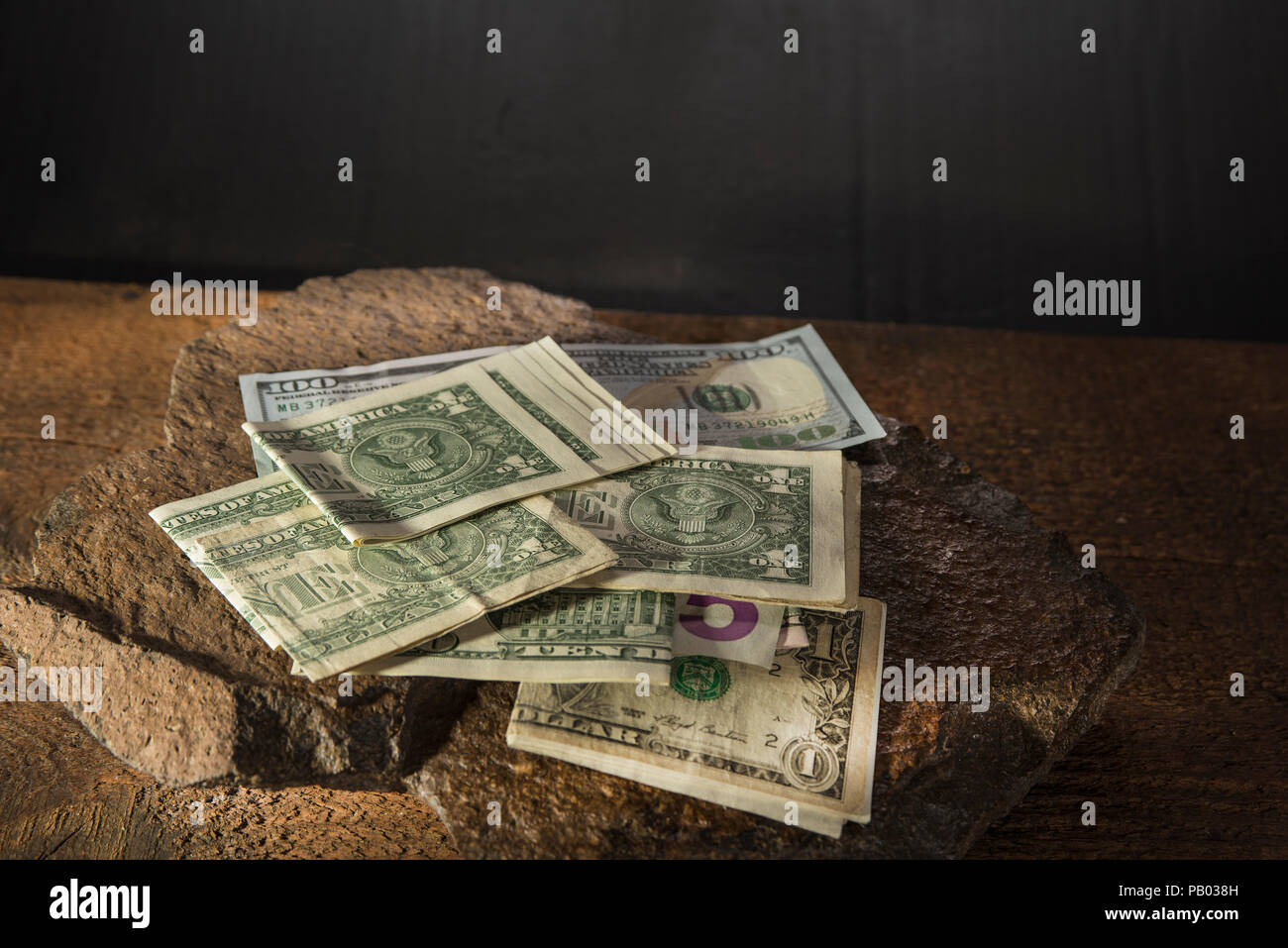Dark image of banknotes hi-res stock photography and images - Alamy